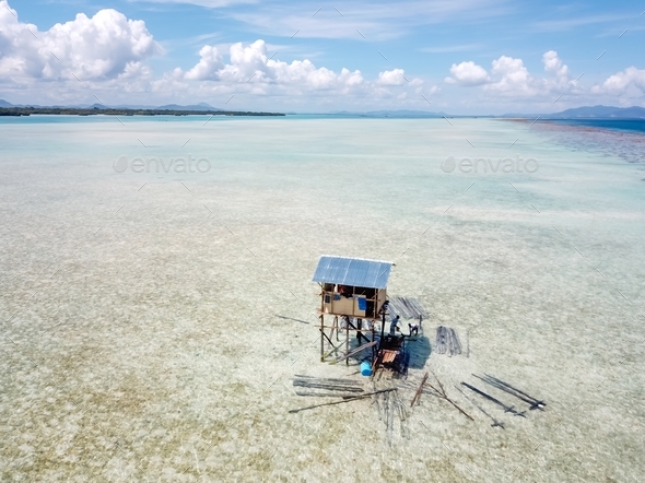 aerial view of small hut on celebes sea in semporna, borneo, malaysia ...