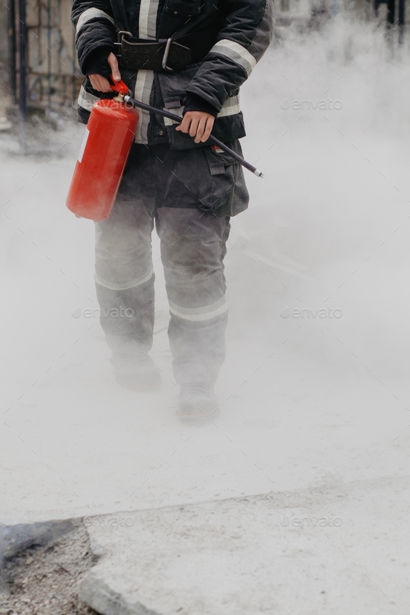 Fireman with fire extinguisher Stock Photo by Katerina_zhiltsova ...