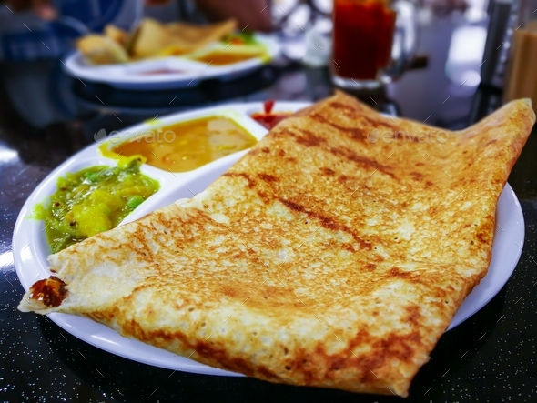 Thosai, popular indian food in Malaysia for breakfast. Served with ...