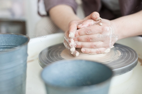 Woman doing pottery - close up photo of hands while doing pottery on ...