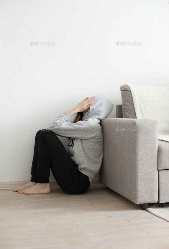 Mental health - woman sitting at the floor having emotional breakdown ...
