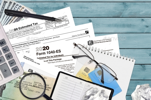IRS form 1040-es Estimated tax for Individuals lies on flat lay office ...