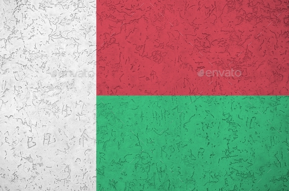 Madagascar flag depicted in bright paint colors on old relief ...