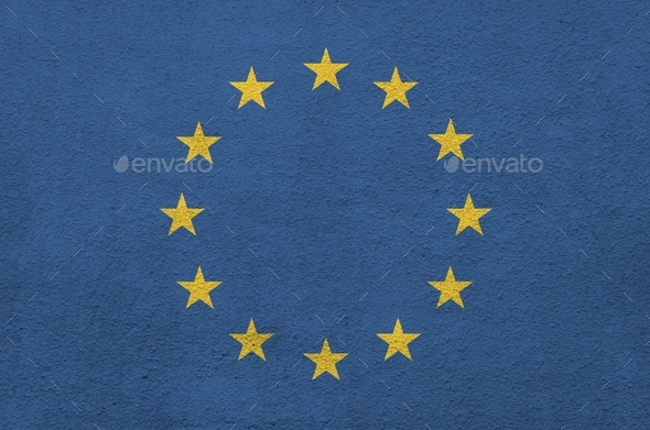 European union flag depicted in bright paint colors on old relief ...