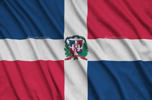 Dominican Republic flag is depicted on a sports cloth fabric with many ...
