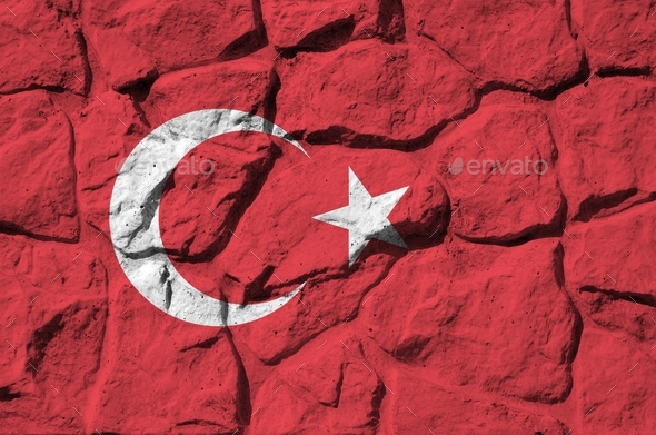 Turkey flag depicted in paint colors on old stone wall close up Stock ...