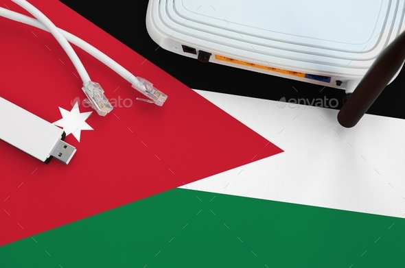 Jordan flag depicted on table with internet rj45 cable, wireless usb wi ...