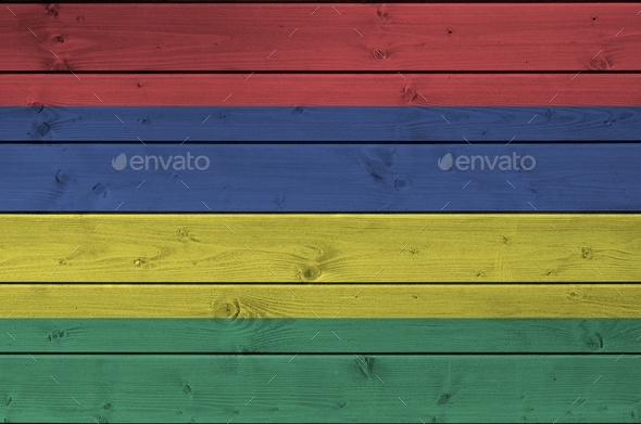 Mauritius flag depicted in bright paint colors on old wooden wall close ...