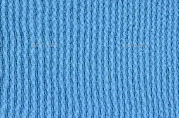 The texture of the fabric in blue color. Material for making shirts and ...