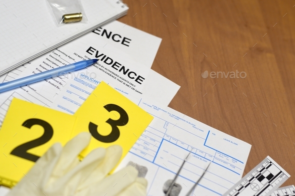 Paperwork during crime scene investigation process in csi laboratory ...
