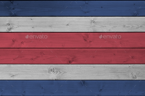Costa Rica flag depicted in bright paint colors on old wooden wall ...