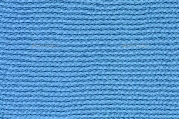 The texture of the fabric in blue color. Material for making shirts and ...
