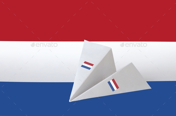 Netherlands flag depicted on paper origami airplane. Oriental handmade ...