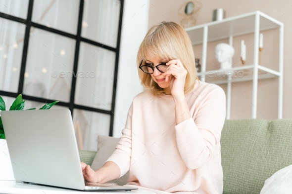 Woman typing at laptop and working from home office Stock Photo by Anna ...