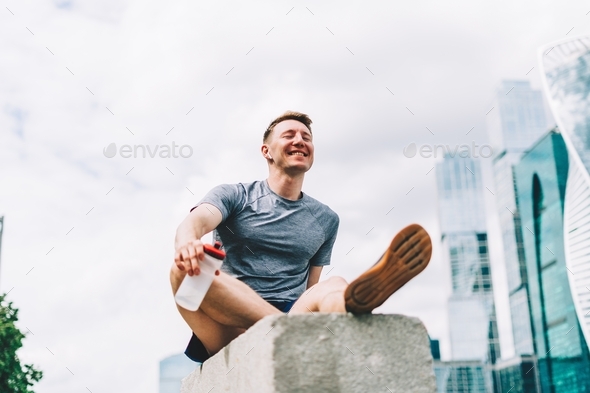 Athlete. Relax outside after workout. Stock Photo by Anna_Ostanina