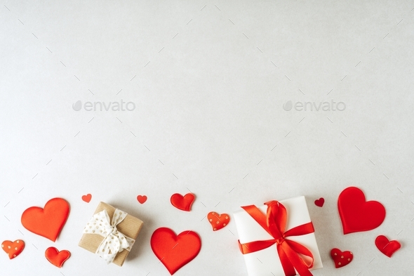 Flat lay Valentine background, gifts with red heart shape and copy ...