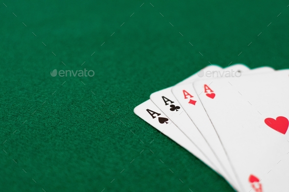 Four aces on a green table surface with copy space. Stock Photo by 9 ...