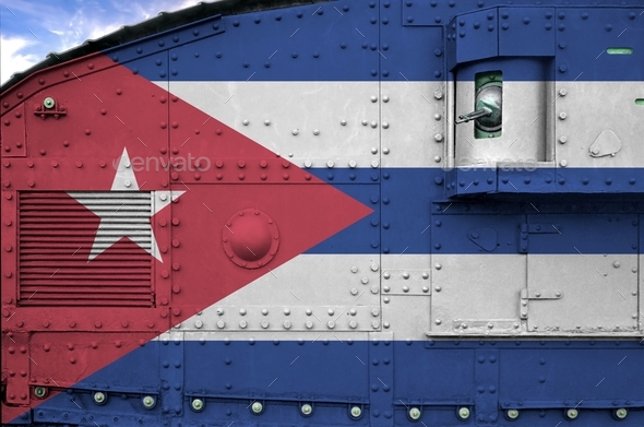 Cuba flag depicted on side part of military armored tank close up. Army ...
