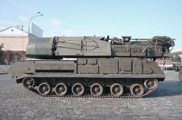 Close up of green armoured caterpillar transport. Modern militar Stock ...