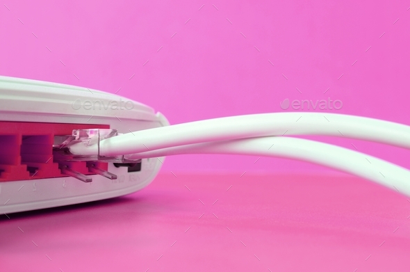 The Internet cable plugs are connected to the Internet router, which ...