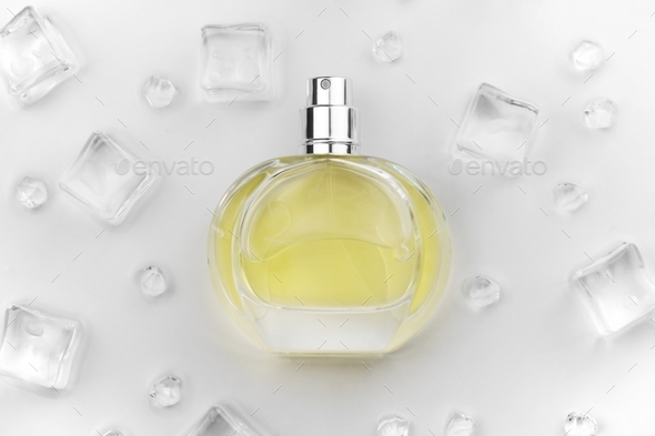Female perfume yellow bottle, Objective photograph of perfume bottle in ...