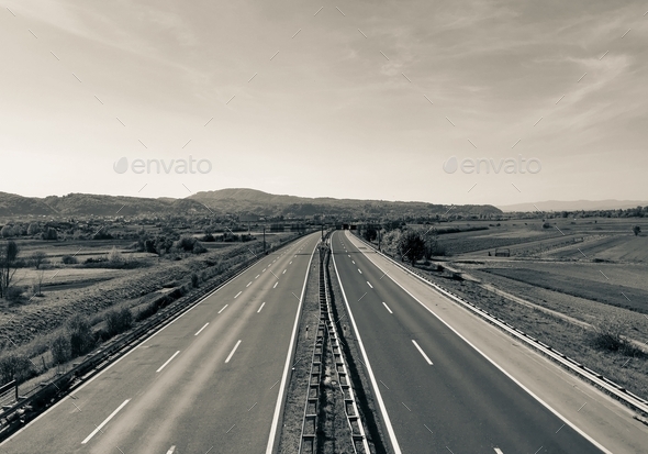 Black and white image of empty motorway during covid lockdown. Stock ...