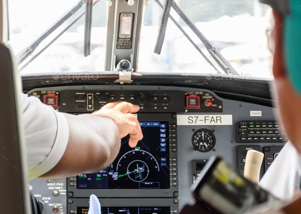 Close-up of aircraft cockpit, passenger jet, dash, navigation, screen ...