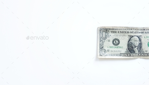 Minimalist image of one dollar bill on white background with copy space ...