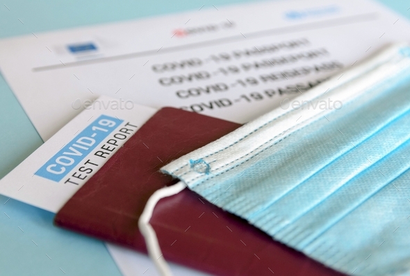 Close-up cropped image of covid-19 passport and immunity health ...
