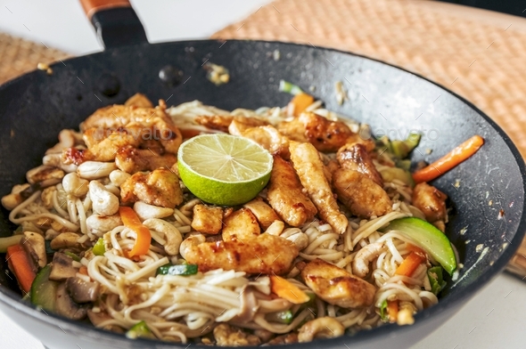 Close-up image of home cooked asian food. Delicious noodles with ...