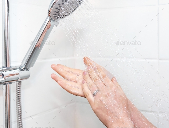 Close-up image of Woman washing hands with soap in shower. Stock Photo ...