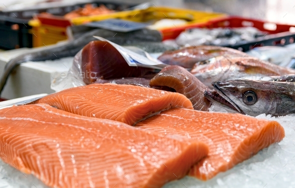 Close-up image of fresh salmon fillets for sale on fish market Stock ...