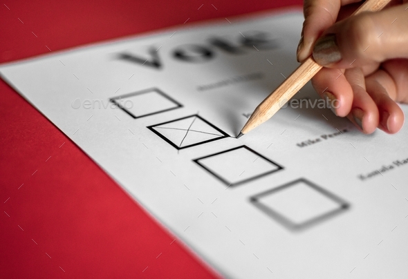 Hand holding pencil and checking box on voting ballot Stock Photo by 9 ...