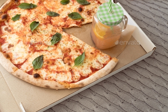 Pizza in delivery craft box and lemonade Stock Photo by natanavo ...