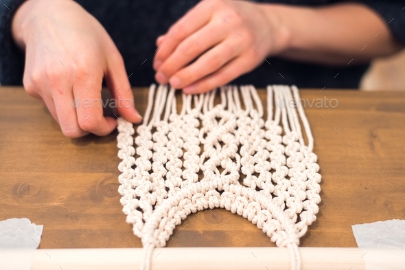 Female hands weave macrame Stock Photo by shapoval08 | PhotoDune