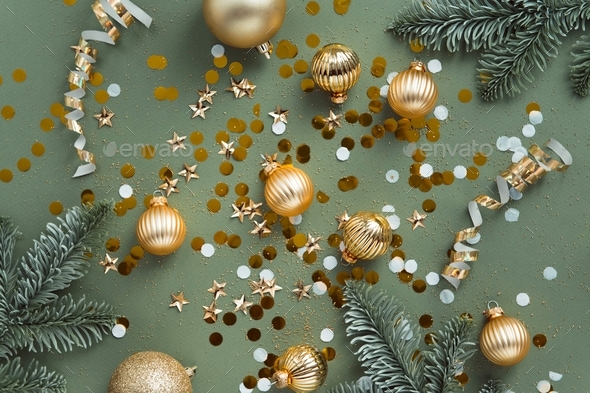 celebrating green color background with confetti and golden balls for ...