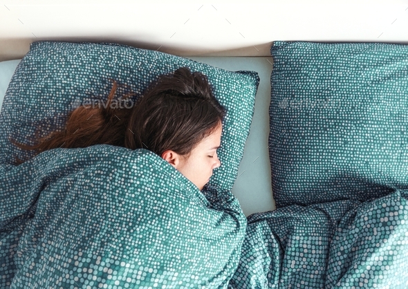 Overhead top view photo of woman sleeping in bed. Stock Photo by ...