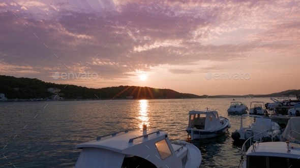 Sunset behind marina, port, sailboats. Sea, summer vacation, sum burst ...