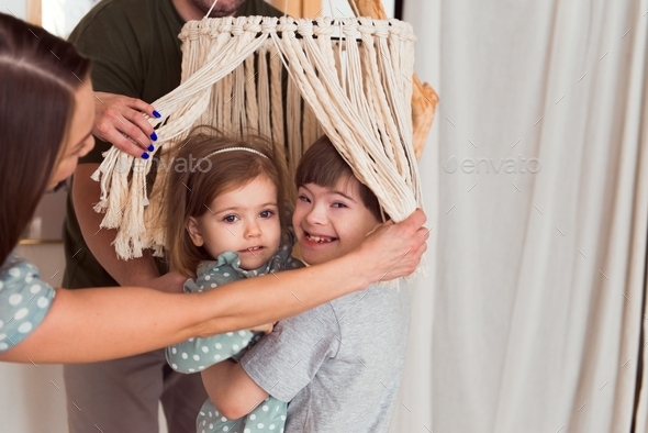 happy family - kids playing hide and seek Stock Photo by shapoval08
