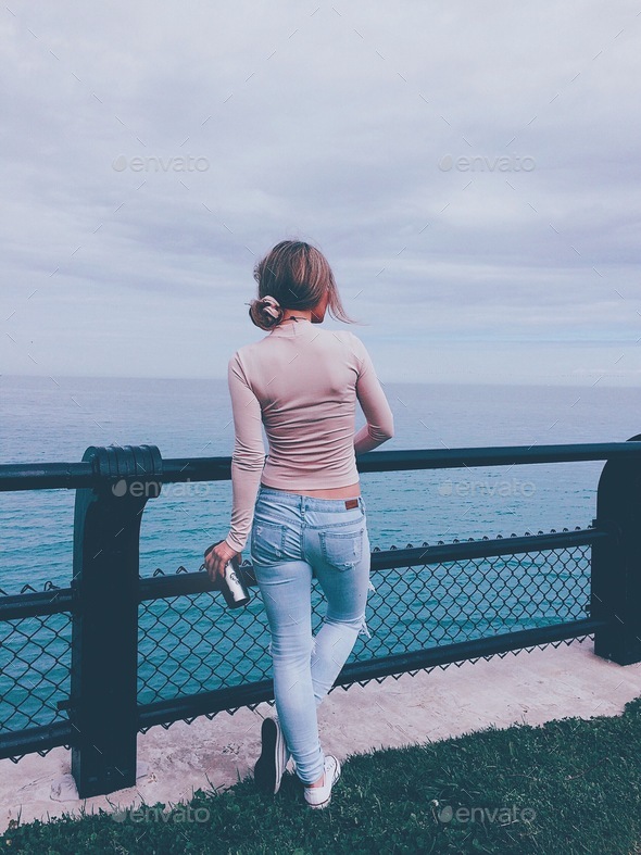 Beautiful lake view and young skinny girl Stock Photo by ElinaVeresk