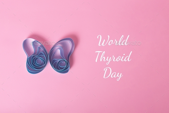 Butterfly from paper. Concept of thyroid gland. World thyroid day ...
