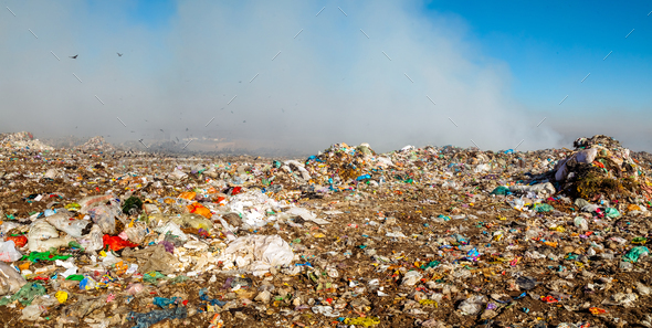 Panoramic view of burning trash piles in landfill Stock Photo by collab ...