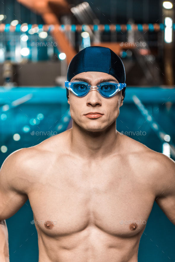 handsome muscular swimmer in swimming cap and goggles Stock Photo by ...