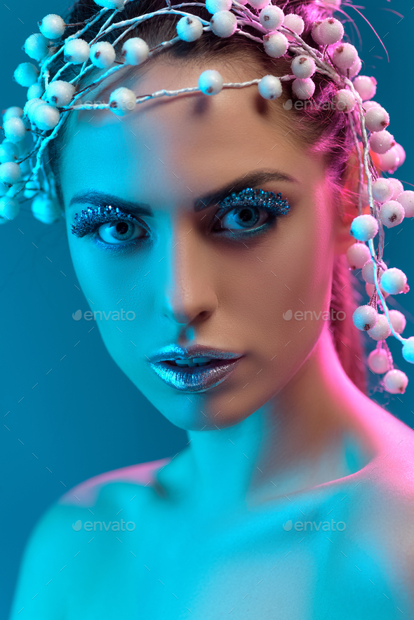 portrait of attractive model with hair accessory, winter makeup and ...