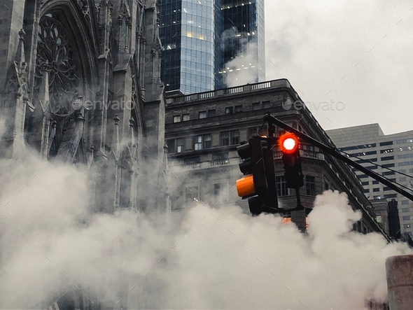 Red light in the smoke in the traffic light junction in New York Stock ...