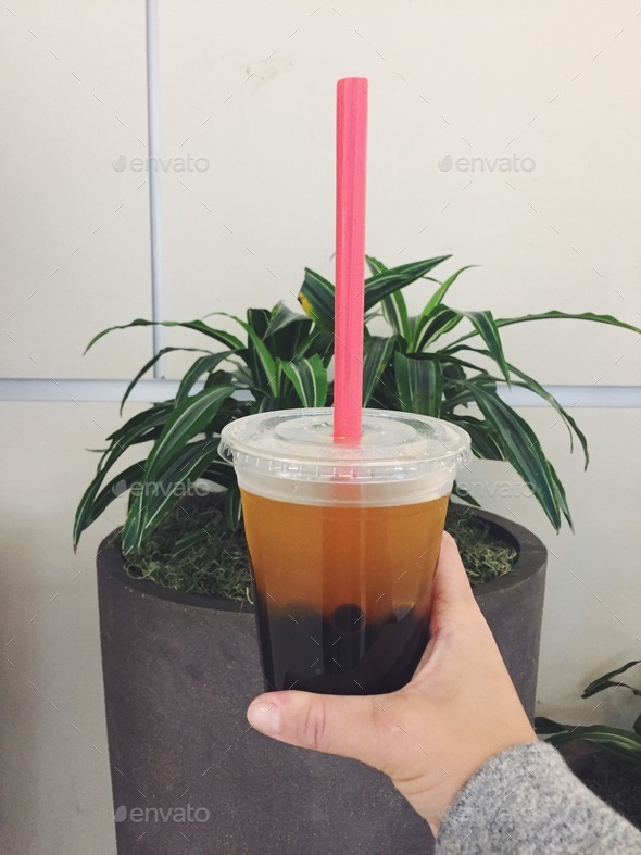 Hand Holding bubble tea Stock Photo by phoenixproduction | PhotoDune