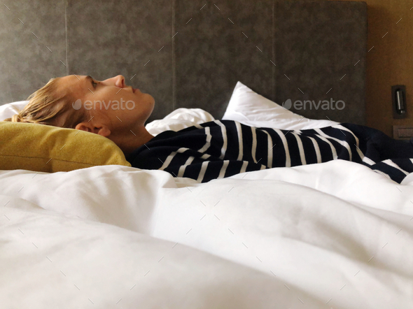 Side view woman laying down in bed relaxing Stock Photo by ...