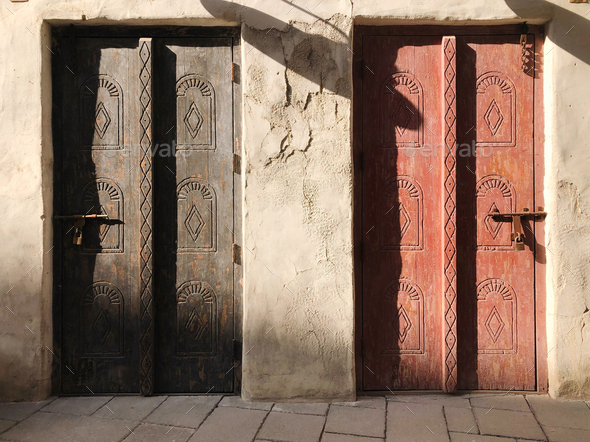 Two old doors side by side Stock Photo by phoenixproduction | PhotoDune