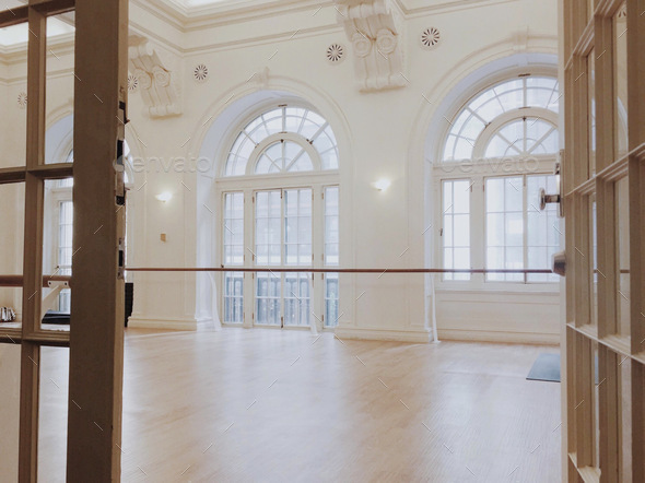 Ballet studio interior with arched windows Stock Photo by phoenixproduction