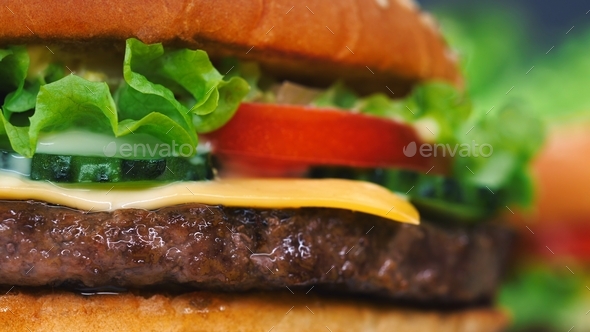 Macro detailed view of juicy beef burger layers Stock Photo by Kohanova
